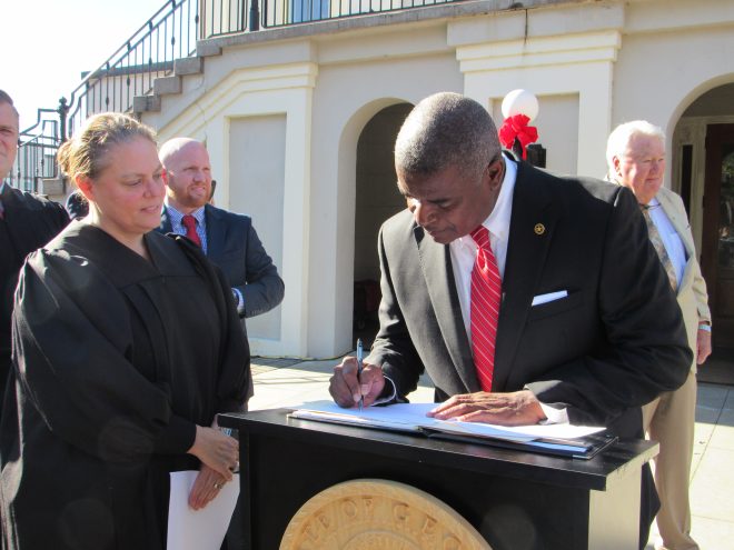 Tim Watkins sworn in as first black, Republican Sheriff of Thomas ...