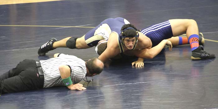 After taking up wrestling for football reasons, Central’s Garrett ...